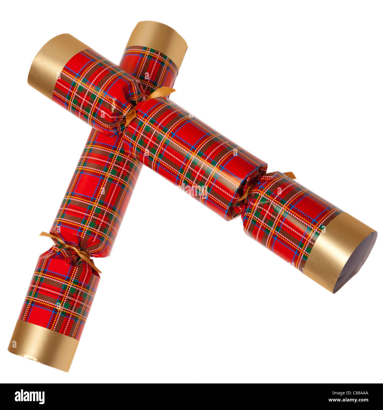 Two christmas crackers on a white isolated background Stock Photo - Alamy