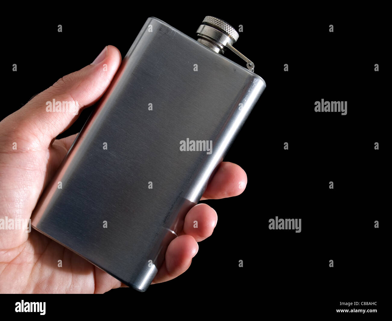 Male hand holding hip flask hi-res stock photography and images - Alamy