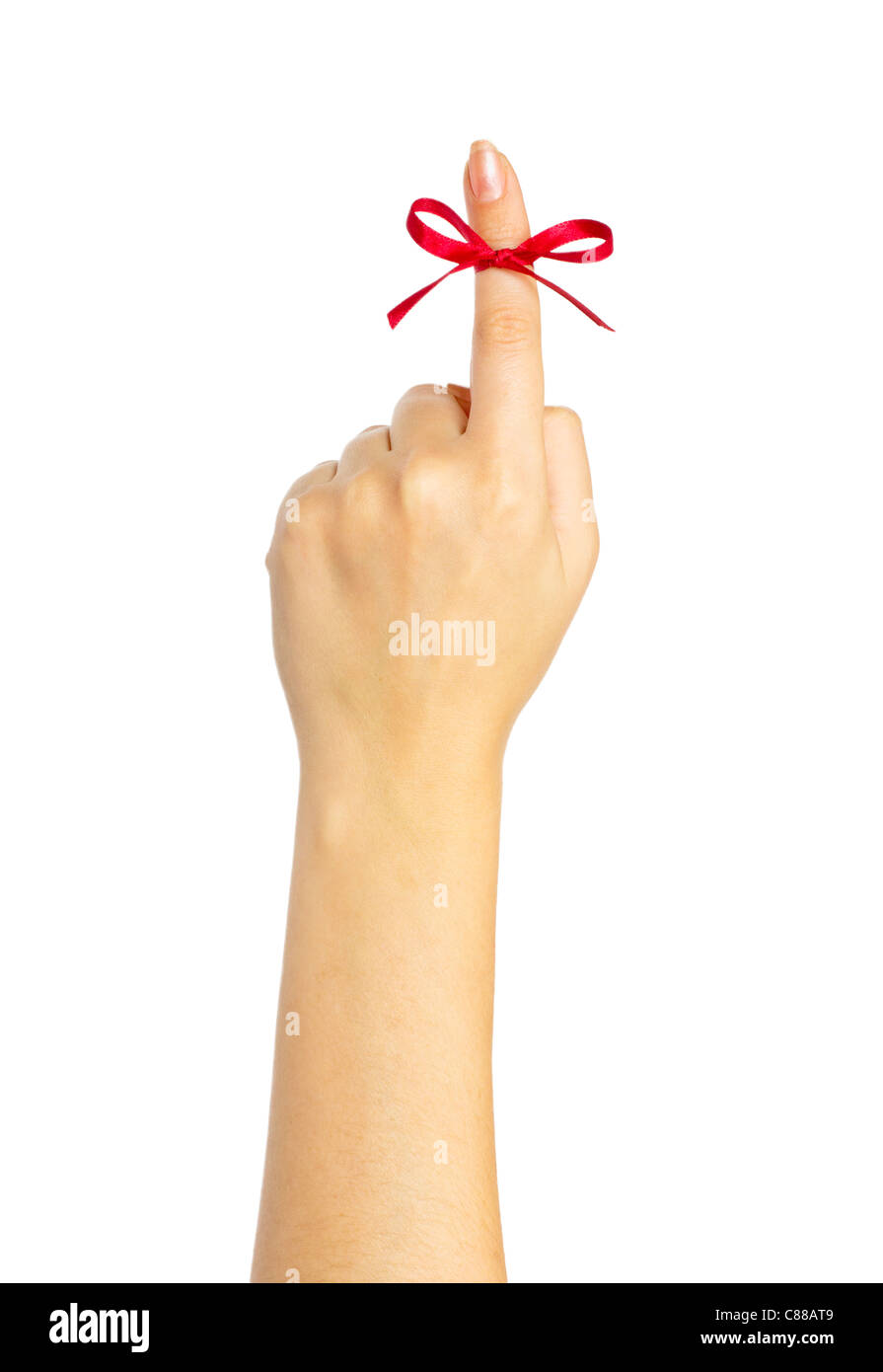 Red bow on finger isolated on white background Stock Photo - Alamy
