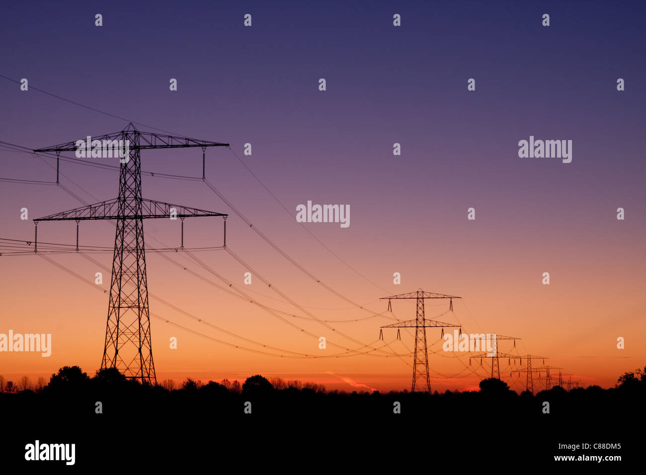 Overhead power lines at dawn Stock Photo - Alamy