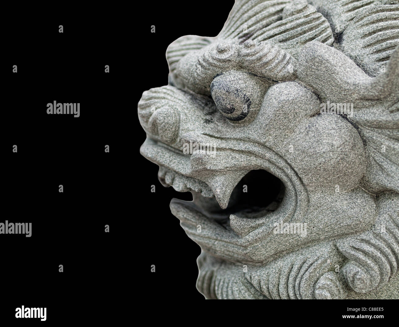 Dragon head stone statue Stock Photo - Alamy
