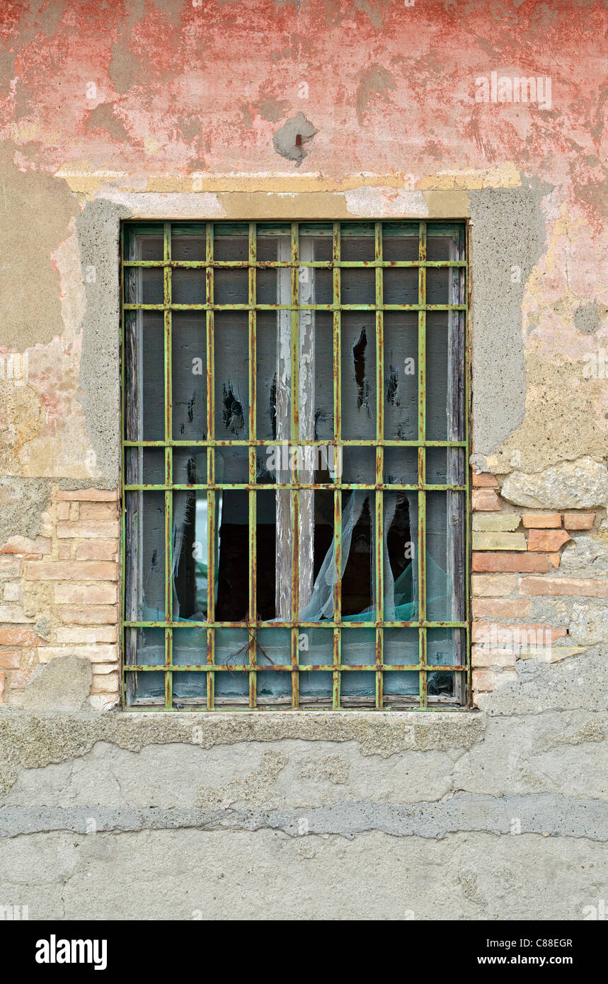 Weathered Worn Window with Rusted Wrought Iron Stock Photo - Alamy