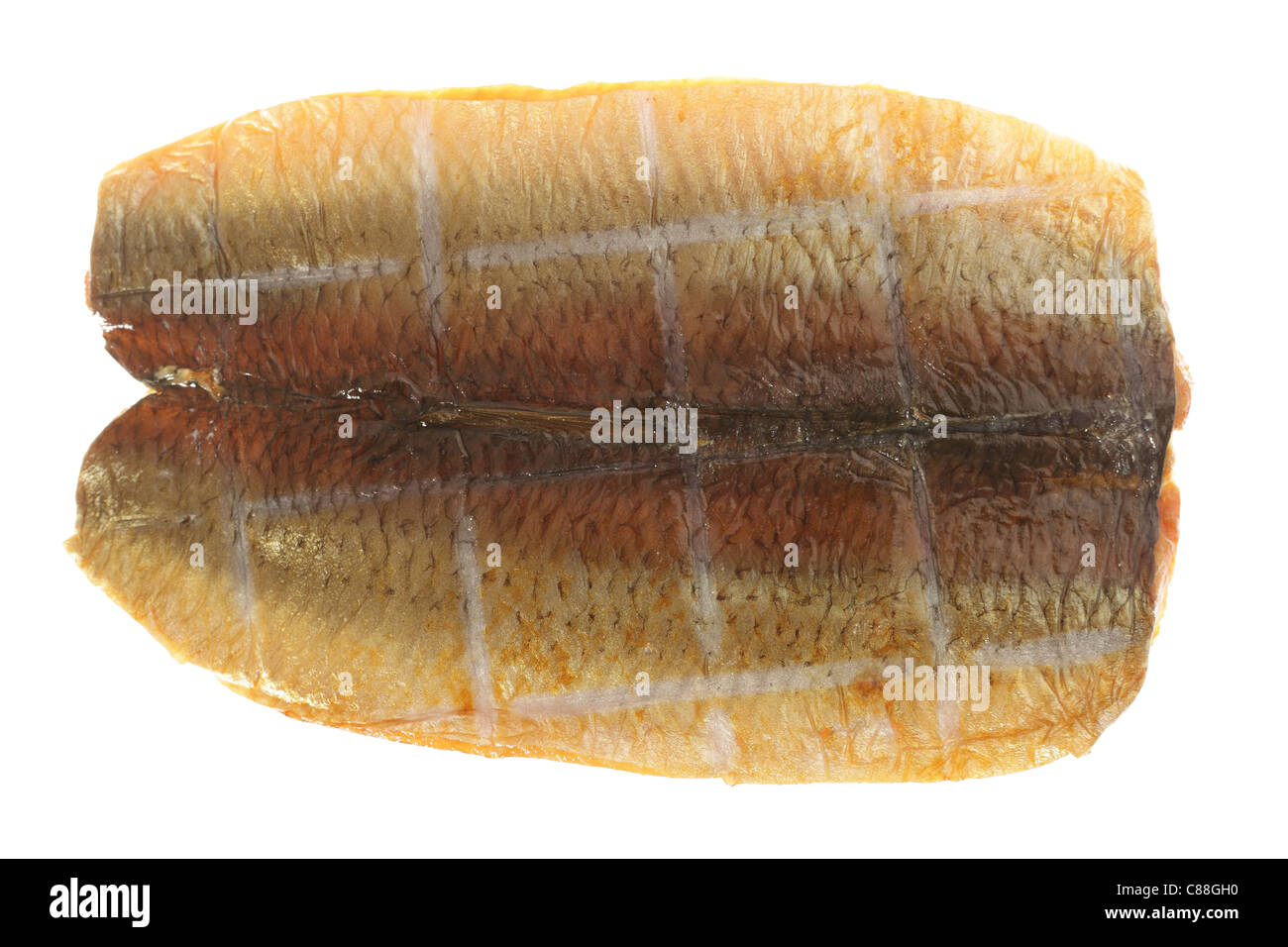 A smoked herring, or kipper, isolated over a white background Stock ...
