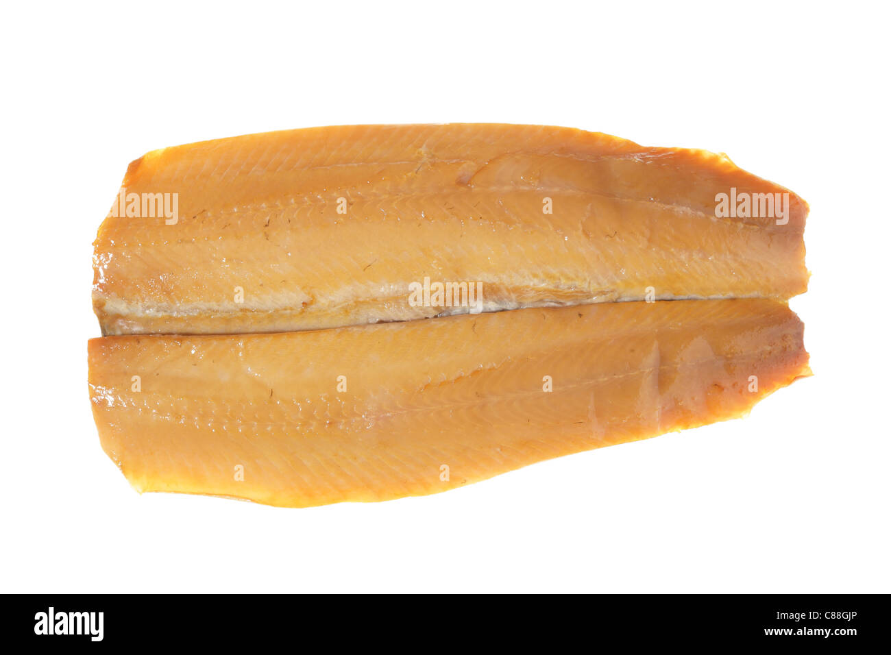 A smoked herring, or kipper, isolated over a white background Stock ...