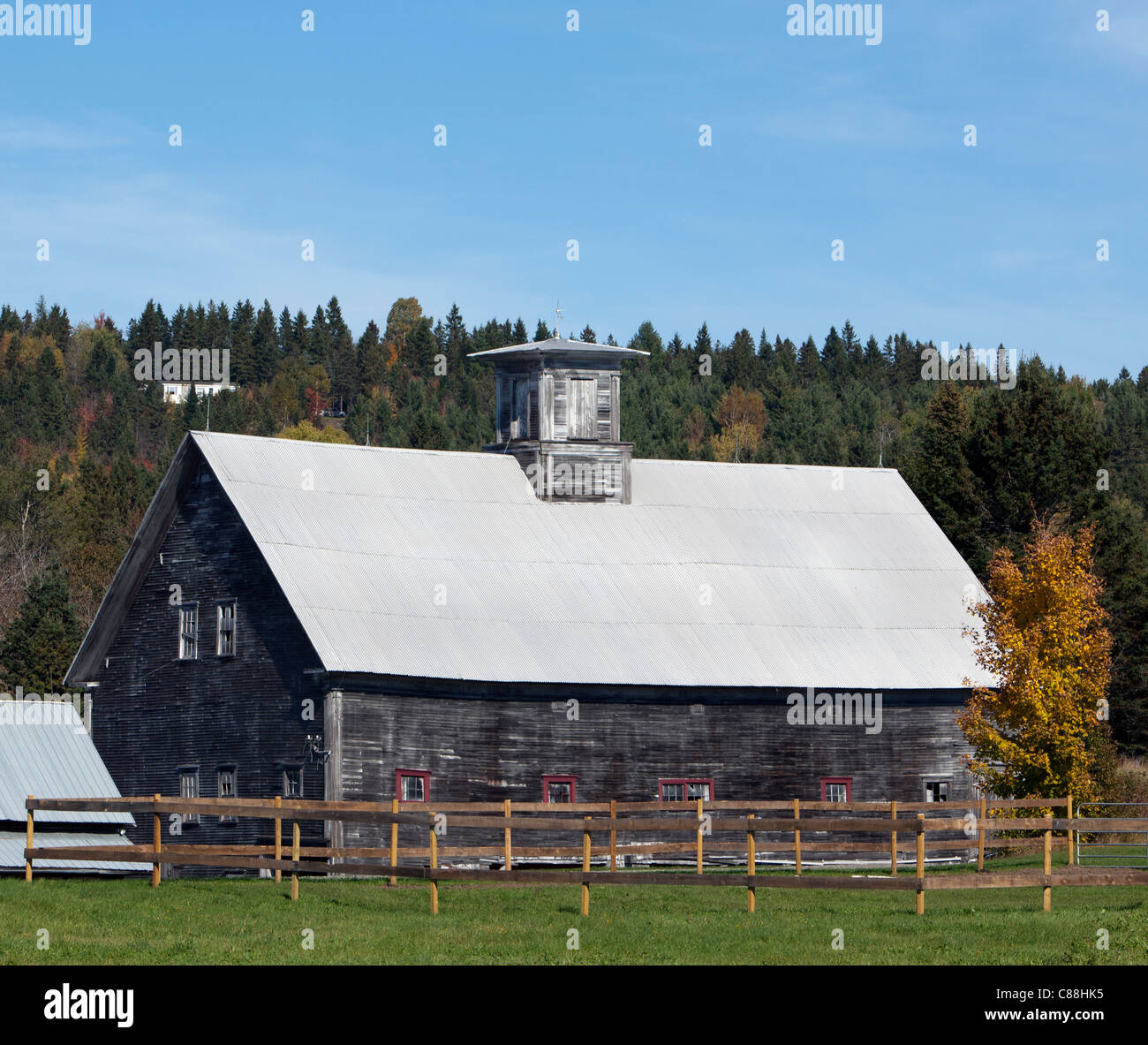 An unpainted barn fence cupula Stock Photo - Alamy