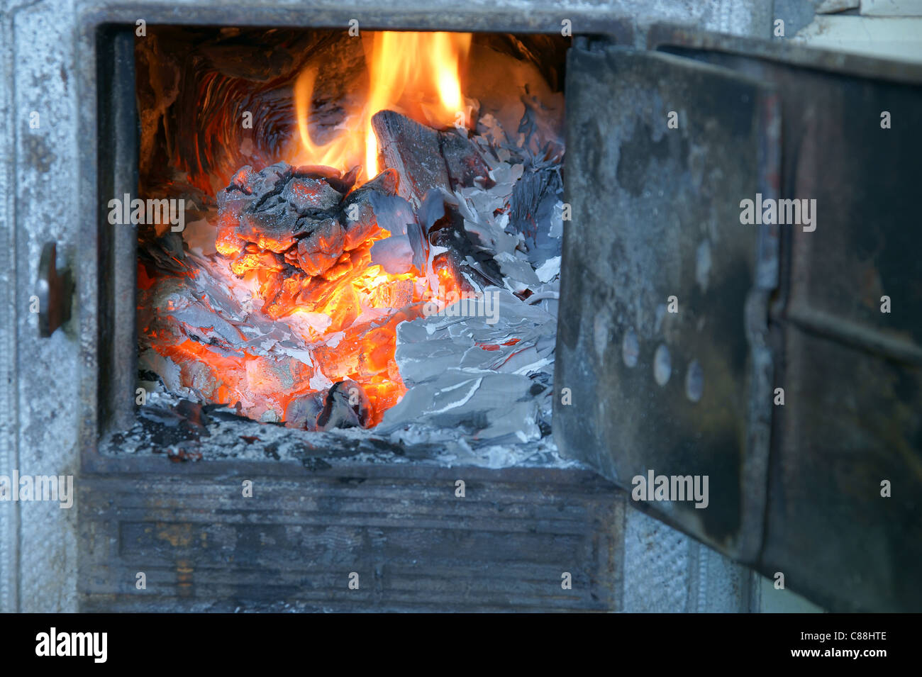 Old fireplace and door, stove, fire Stock Photo - Alamy