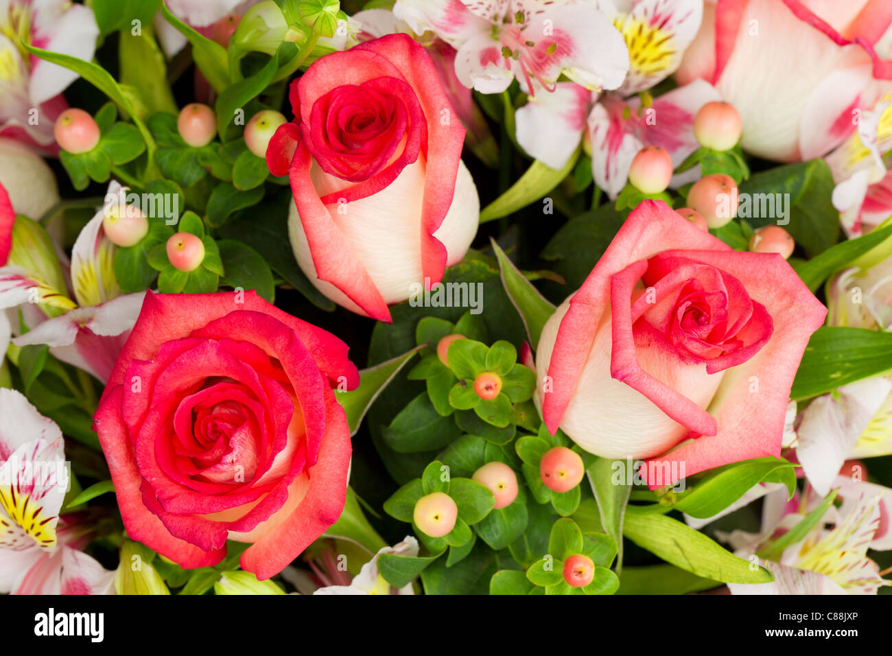 Beautiful Flower Arrangement Made By 3 Big Roses Stock Photo - Alamy