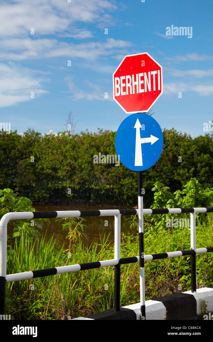 Stop (Berhenti) sign in Malaysian, Asia Stock Photo - Alamy