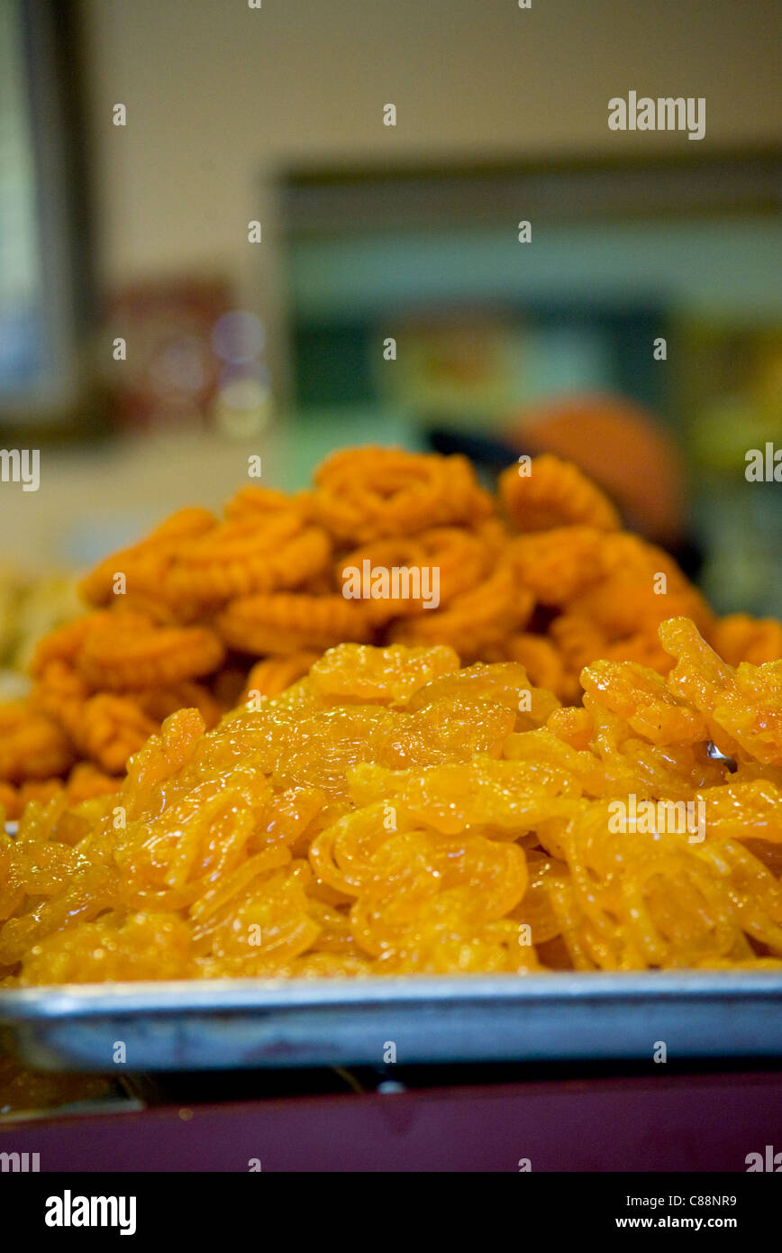 Deep fried jalebis sweets in shop window in Indian bakery Stock Photo ...