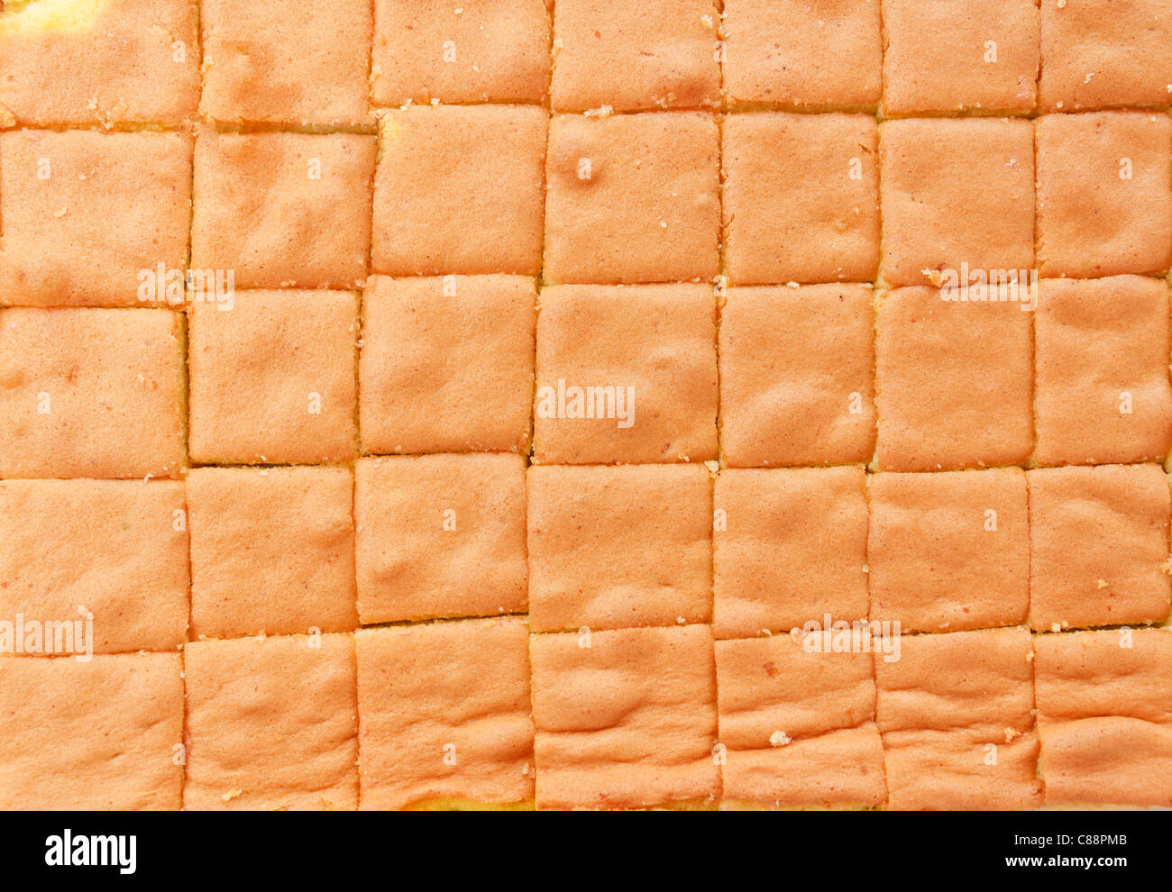 Group of square cakes background Stock Photo - Alamy