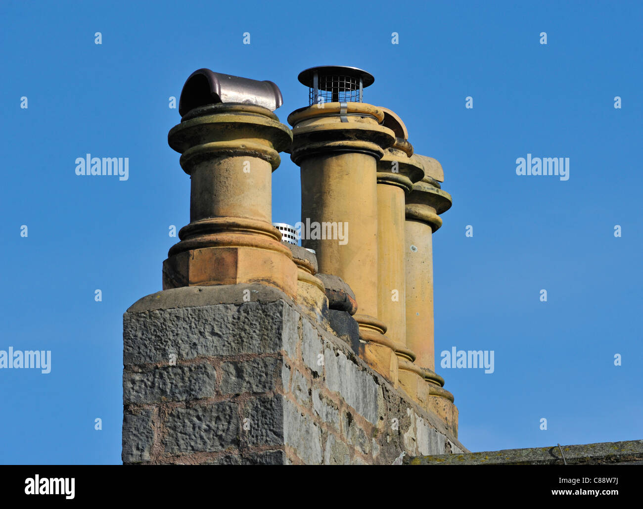 Four chimney pots. Fellside, Kendal, Cumbria, England, United Kingdom ...