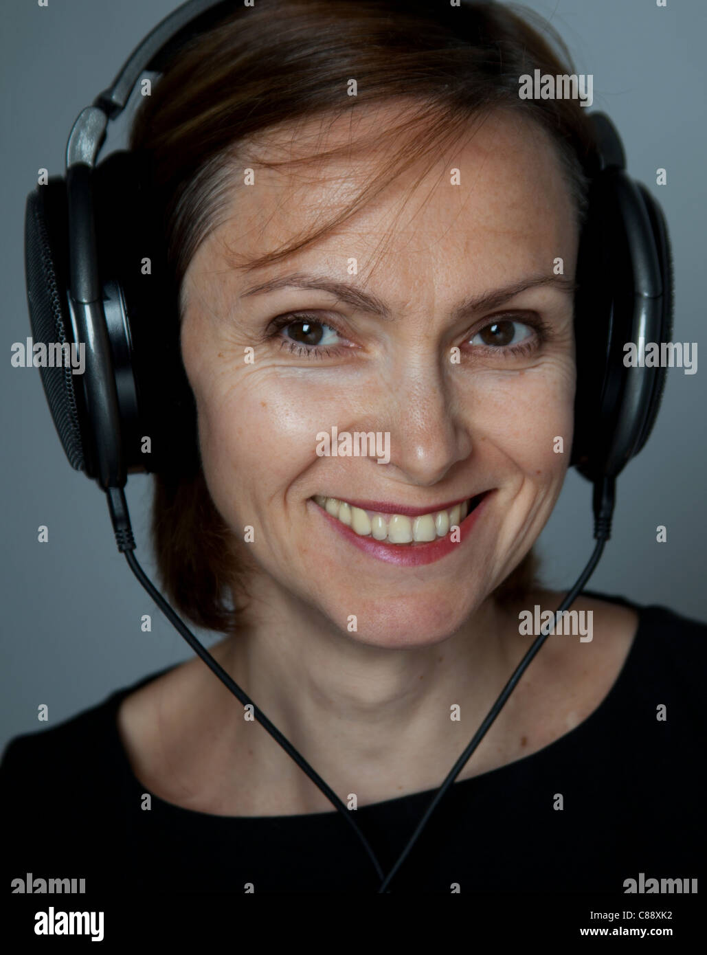 Listening to music Stock Photo - Alamy