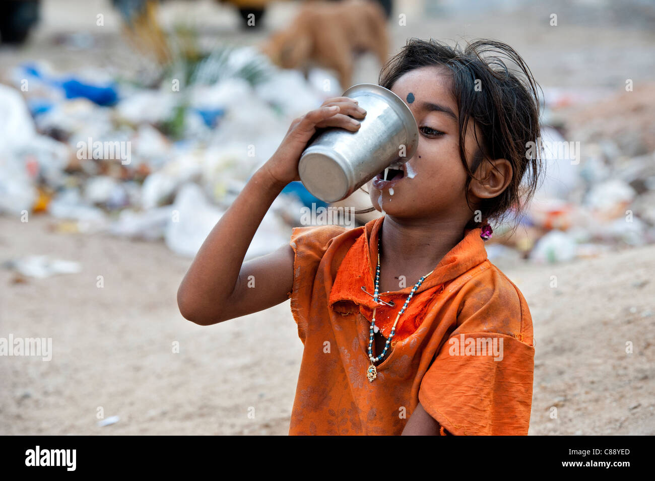 Poor Child Drinking Milk Stock Photos & Poor Child Drinking Milk Stock ...