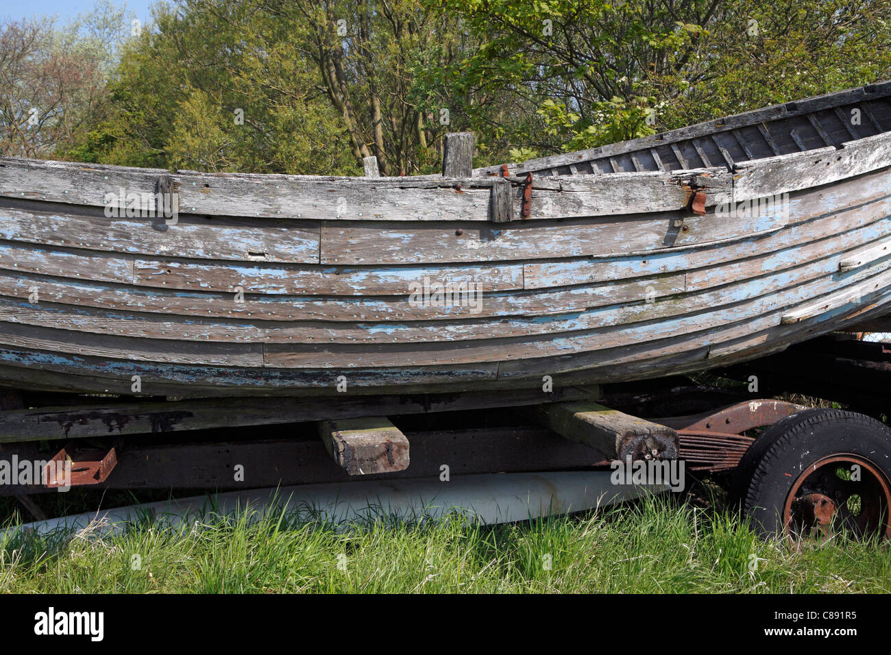 Abandoned clinker built wooden hull, Orford, Suffolk, UK Stock Photo ...