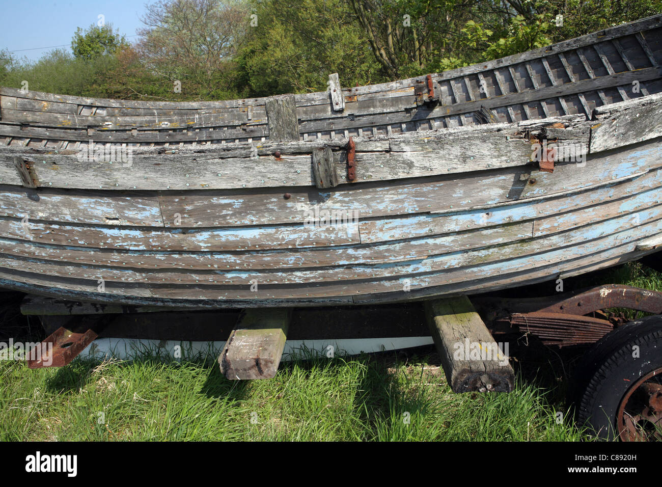 Abandoned clinker built wooden hull, Orford, Suffolk, UK Stock Photo ...