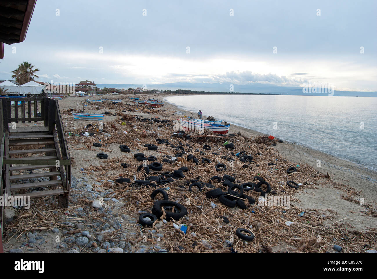 environmental pollution. A beach oh the Calabria with waste and ...