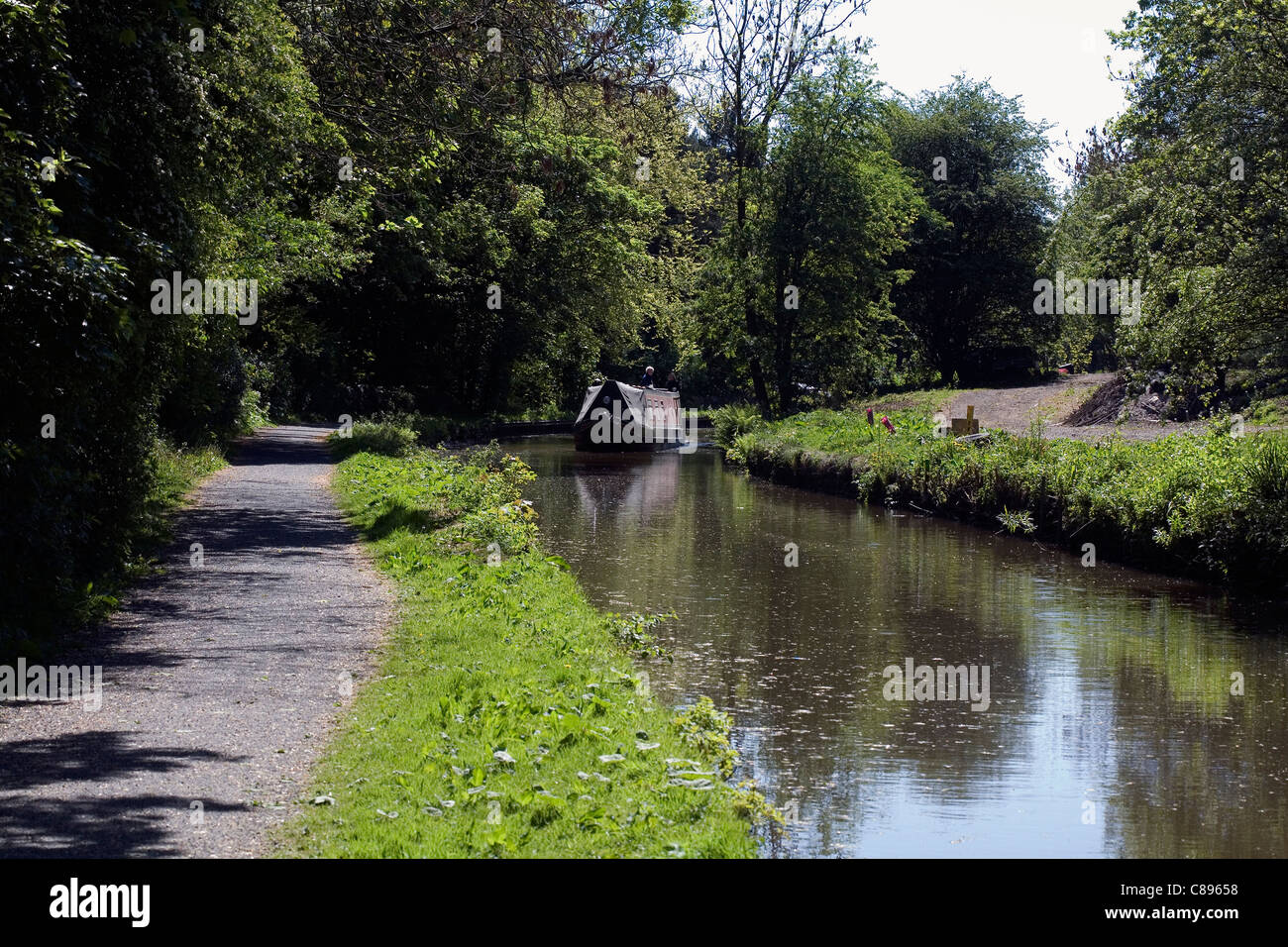 Narrow Boat navigating The Peak Forest Canal Whaley Bridge Derbyshire ...