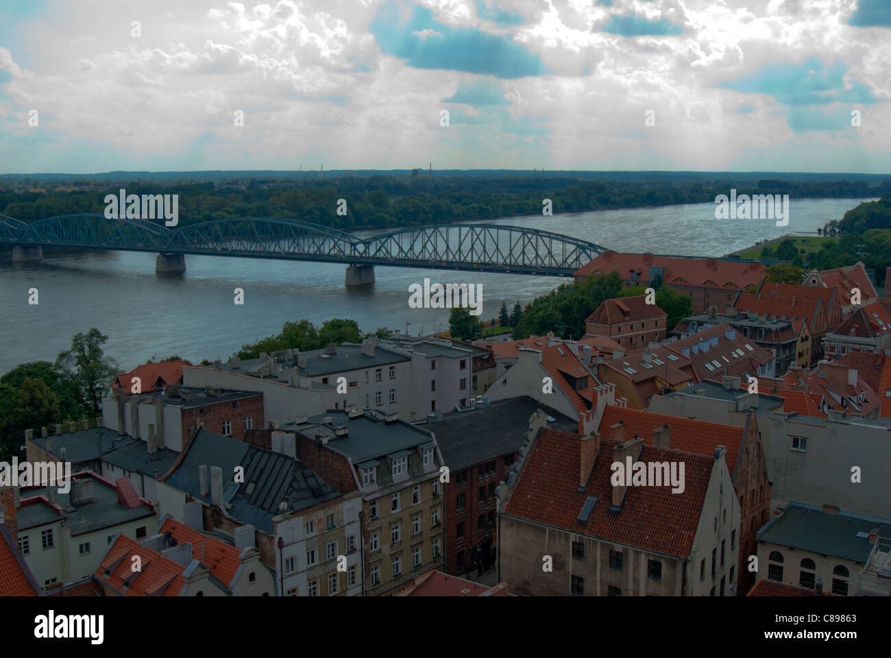 Aerial view of Torun buildings and Wisla river, amazing sky with the ...