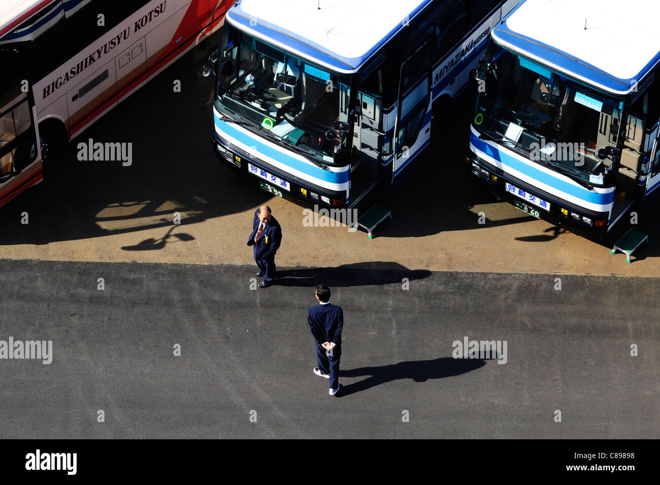 Buses waiting for cruise passengers at the port of Hyuga, Japan Stock ...