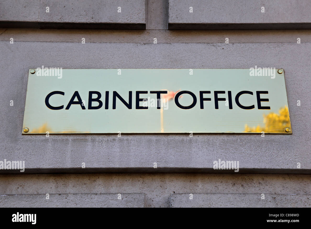 Cabinet Office sign on the 70 Whitehall with the reflection of the ...