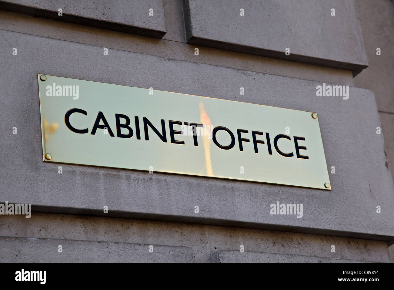 Cabinet Office sign on the 70 Whitehall with the reflection of the ...