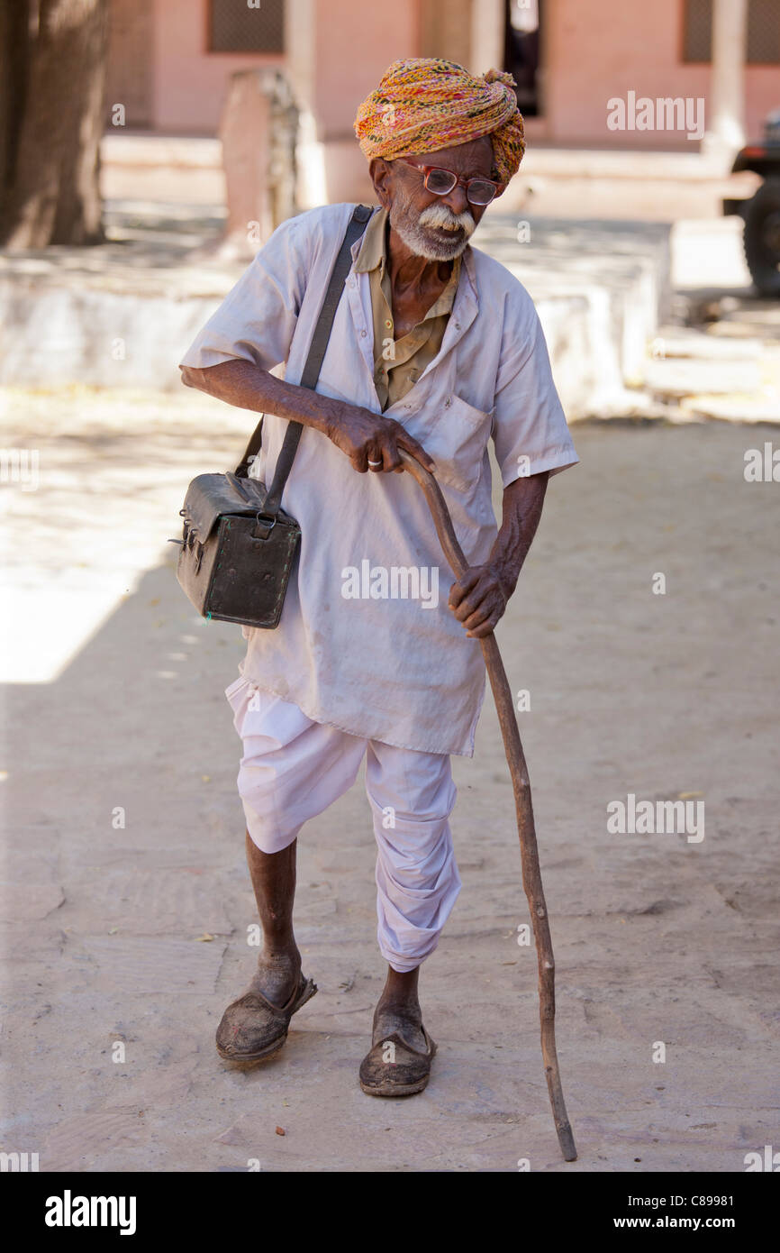 Indian man, the local barber, in typical Rajasthani village of Nimaj ...