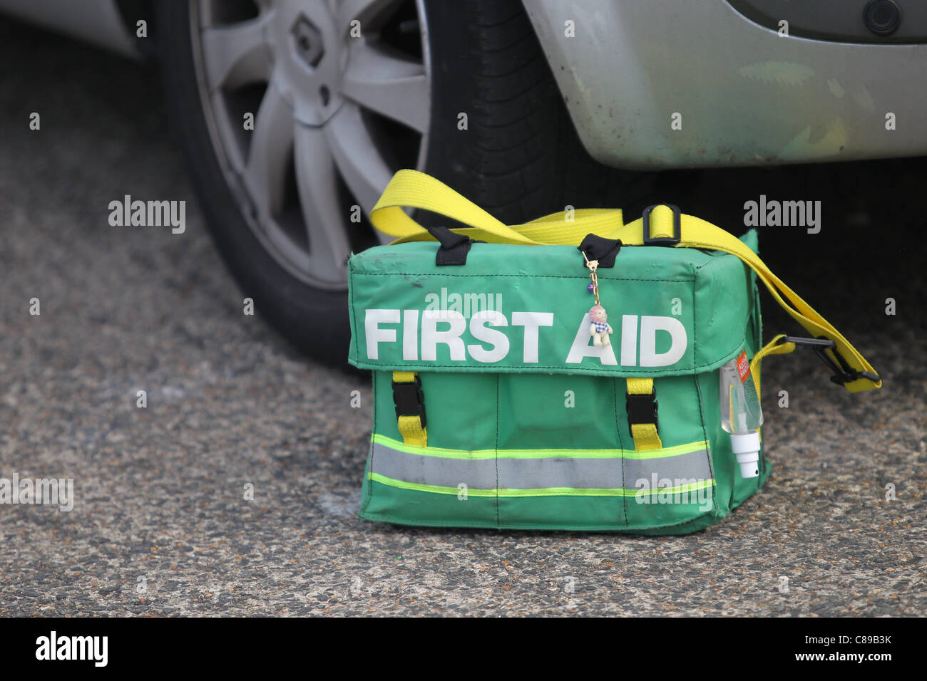 First Aid Kit on the road near a car Stock Photo - Alamy