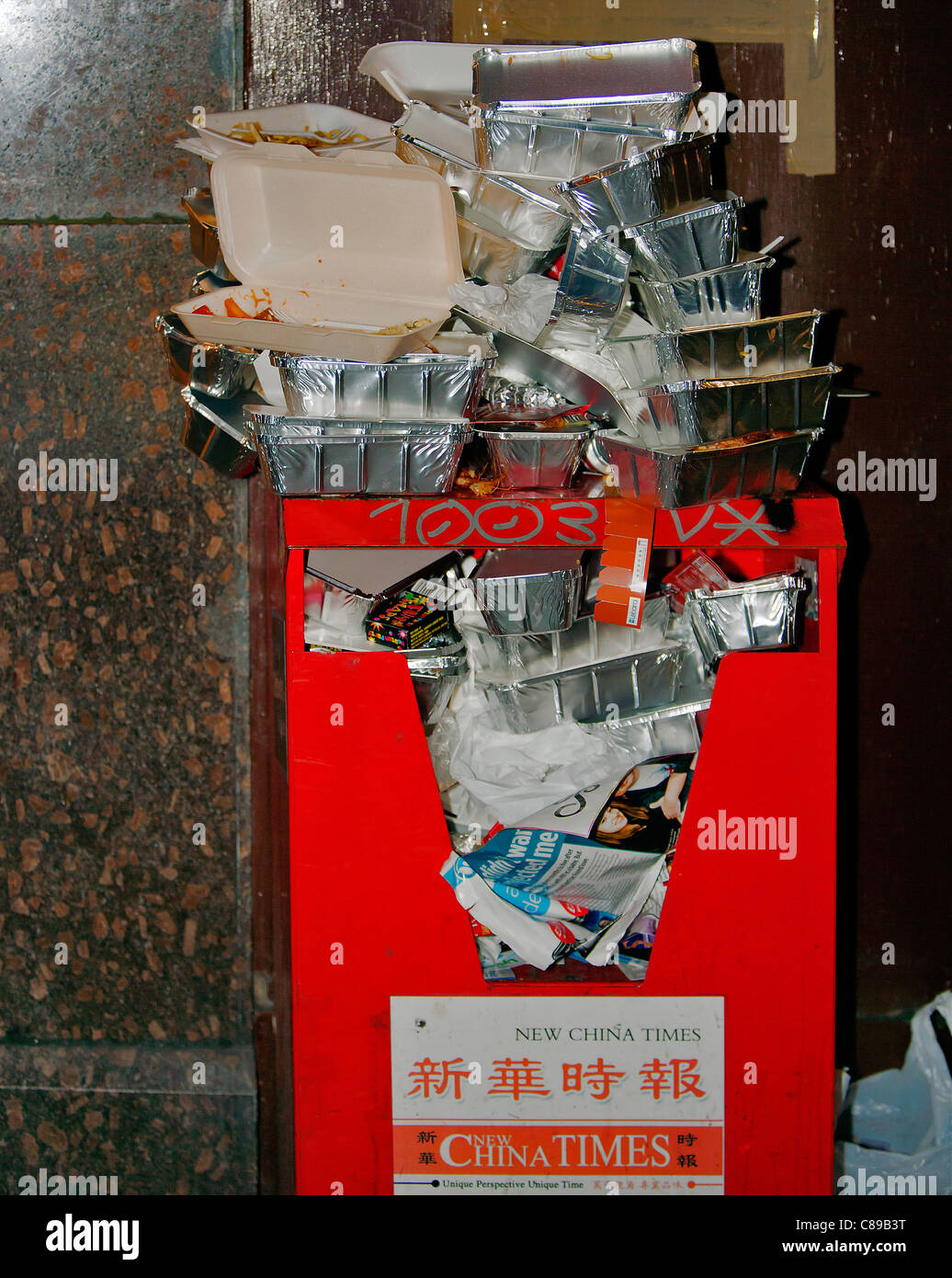 Chinese New Year. Overloaded waste bin. China Town, London, England, UK ...