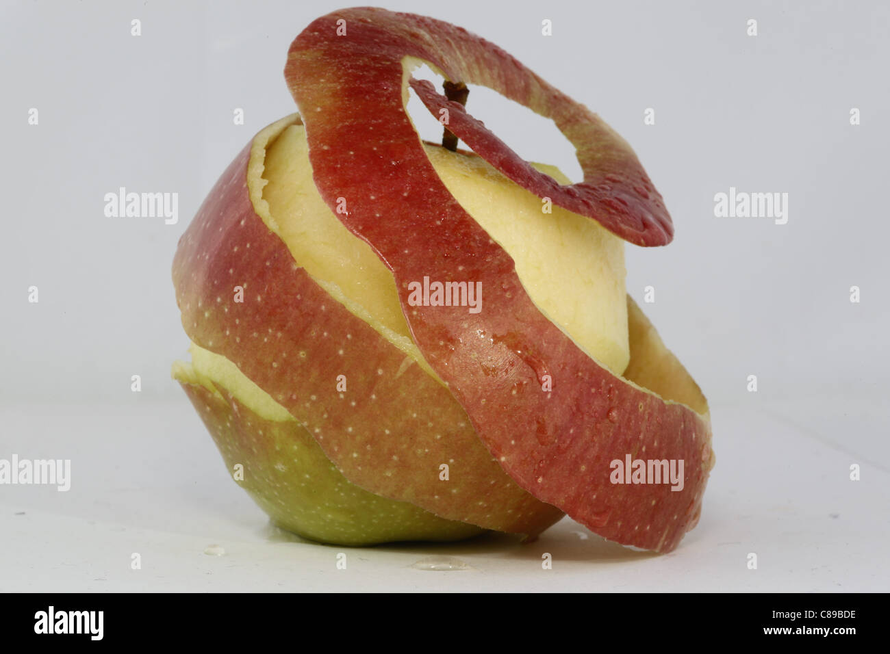 A peeled apple Stock Photo - Alamy