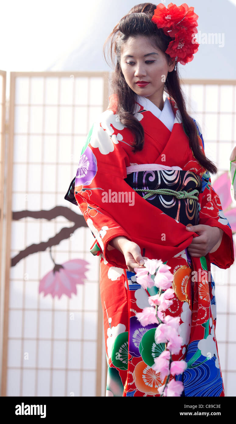 Japanese woman modeling the latest Kimono fashions at the Los Angeles ...