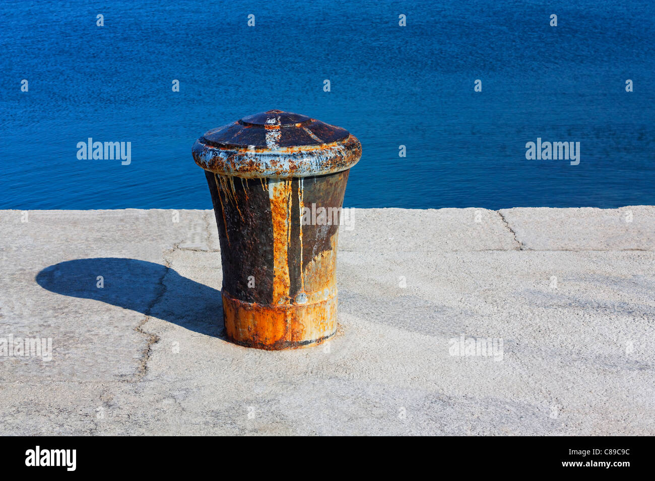 Iron post for anchoring Stock Photo - Alamy