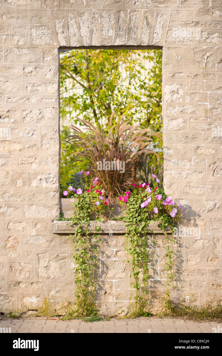 Rustic Stone Window with Flowers in Flowerbox Stock Photo - Alamy