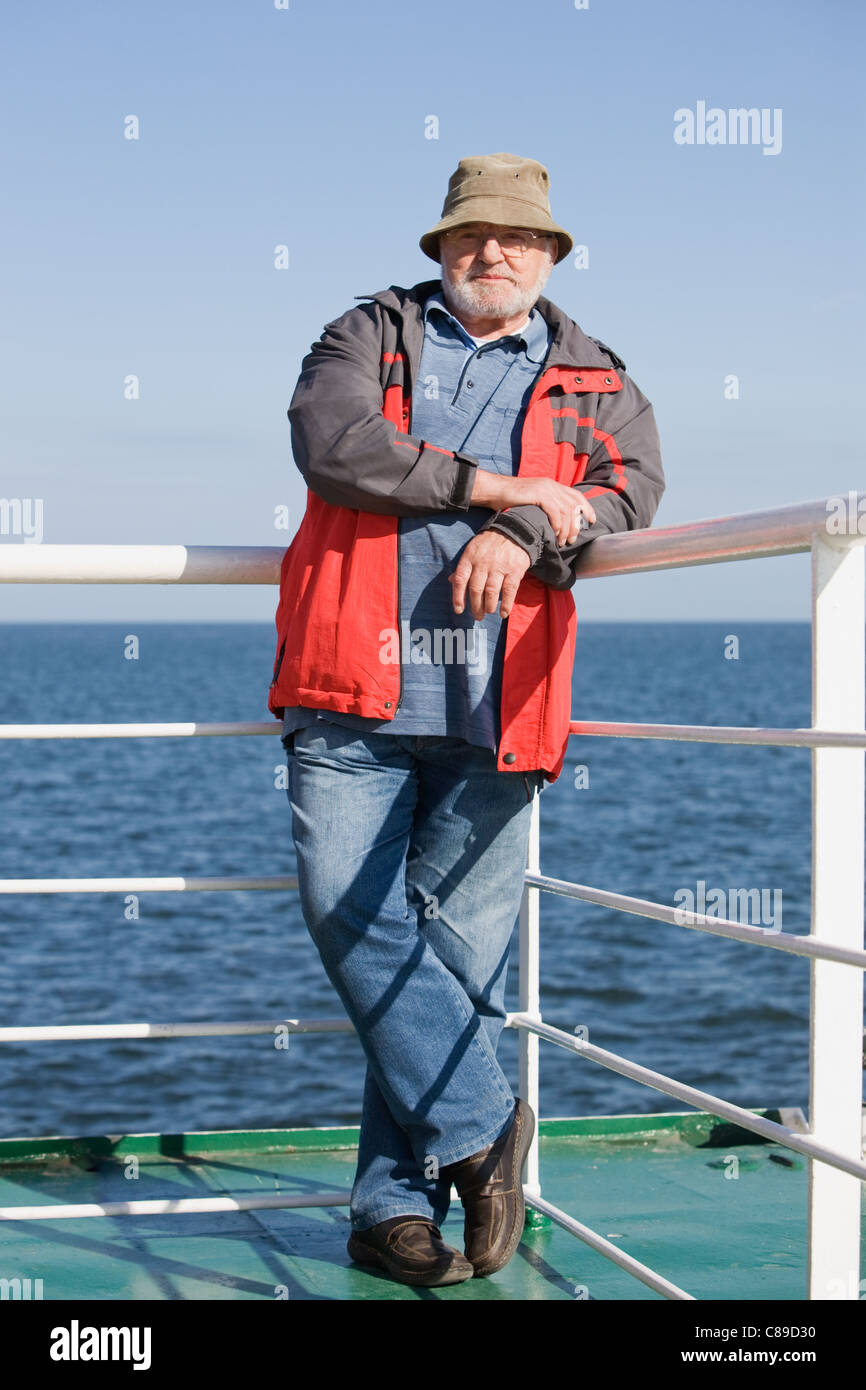 Man standing on ship deck hi-res stock photography and images - Alamy