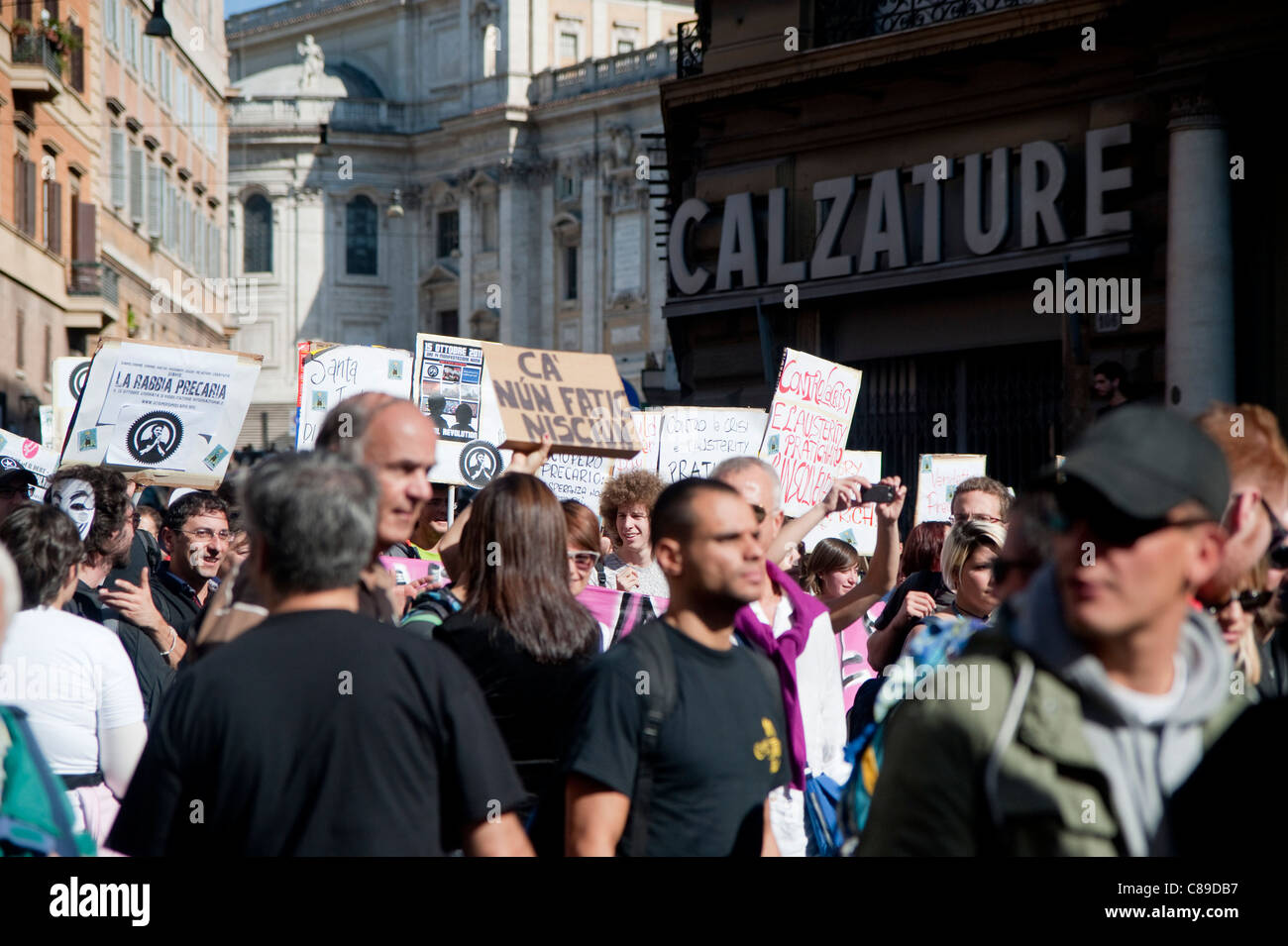 Protesters hold signs and shout slogans during a rally inspired by the ...