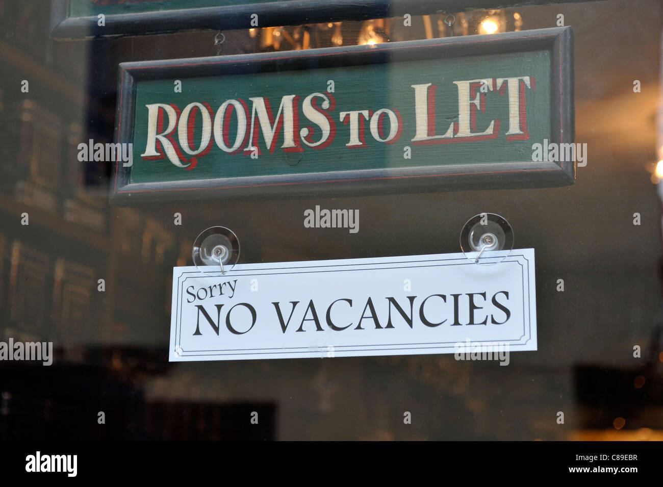 guest house window sign Stock Photo - Alamy