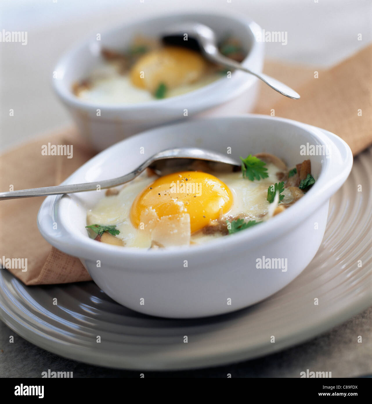 Coddled eggs with capers Stock Photo - Alamy