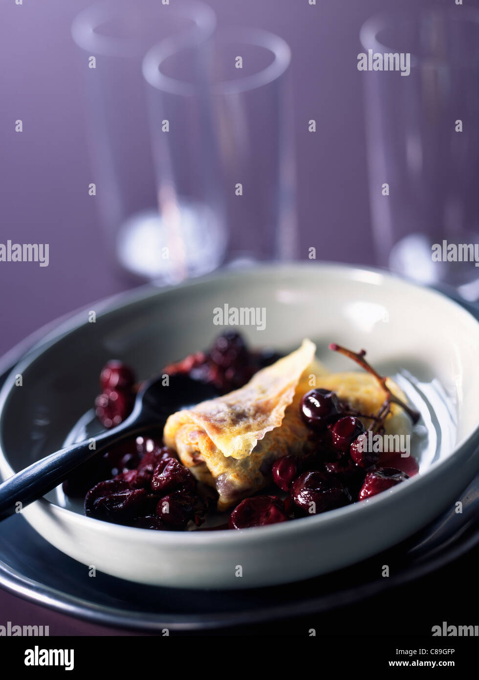 Crepe with red beans and grape sauce Stock Photo - Alamy