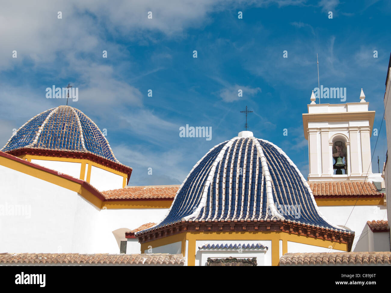 Mediterranean church detail, bell tower and blue tiled domes Stock ...