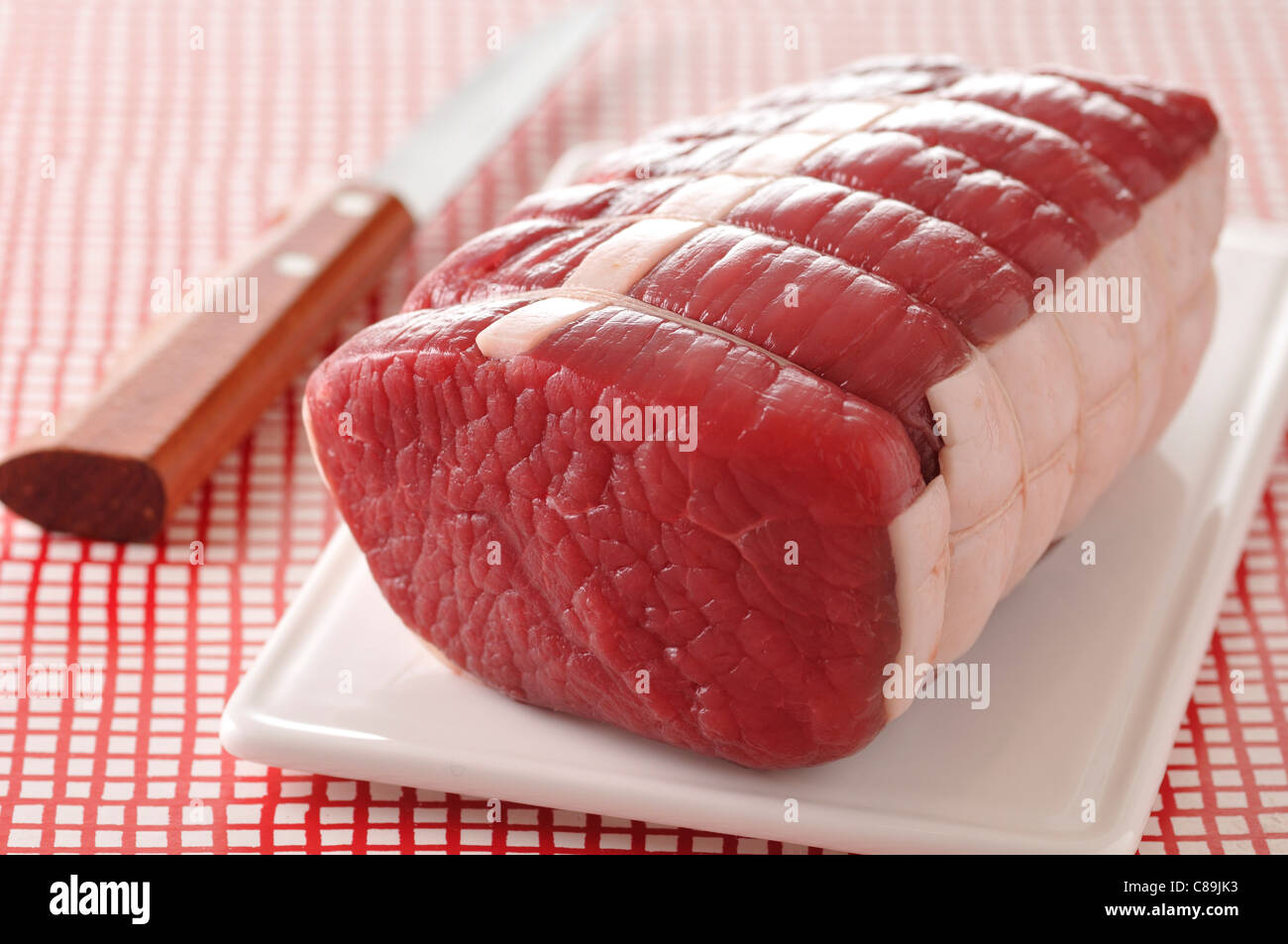 Raw roast beef Stock Photo - Alamy