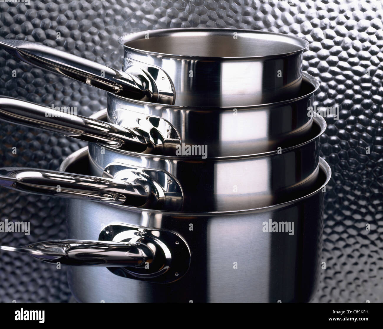 Set of steel cooking pans Stock Photo - Alamy