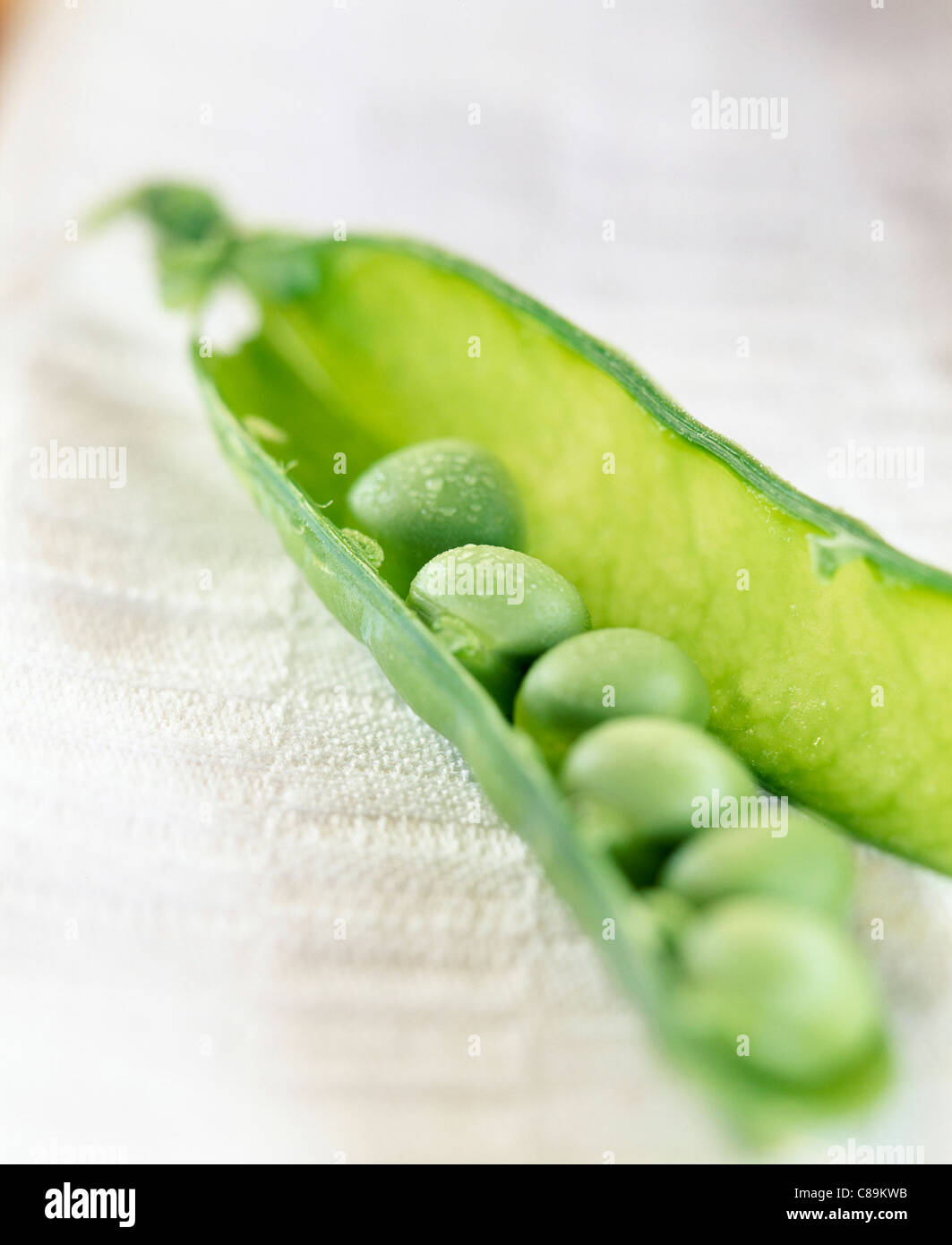 Peas in the pod Stock Photo - Alamy