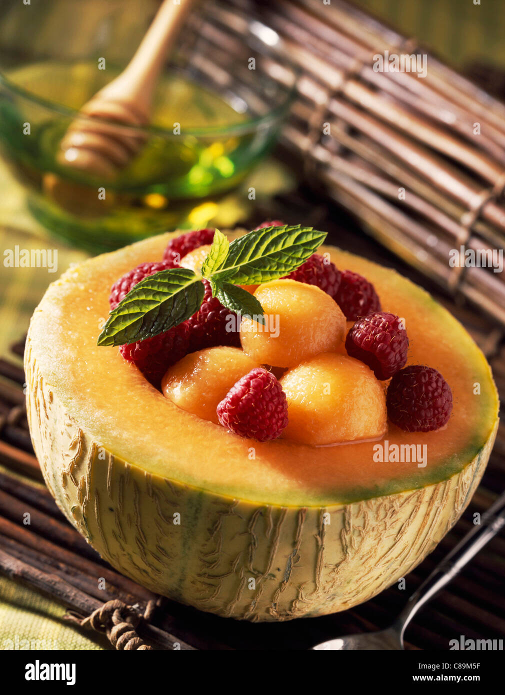 Melon and raspberry Stock Photo - Alamy