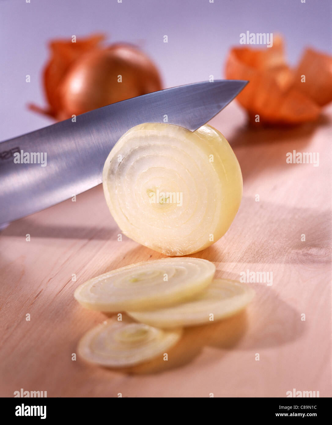 Sliced onion and knife Stock Photo - Alamy