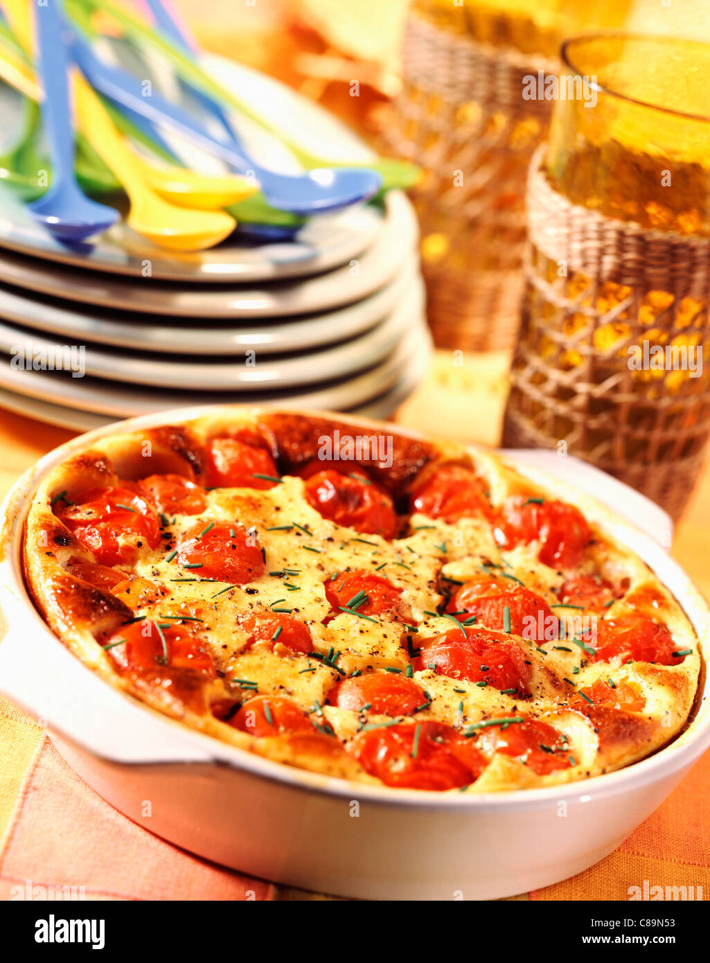 Cherry tomato batter pudding Stock Photo - Alamy