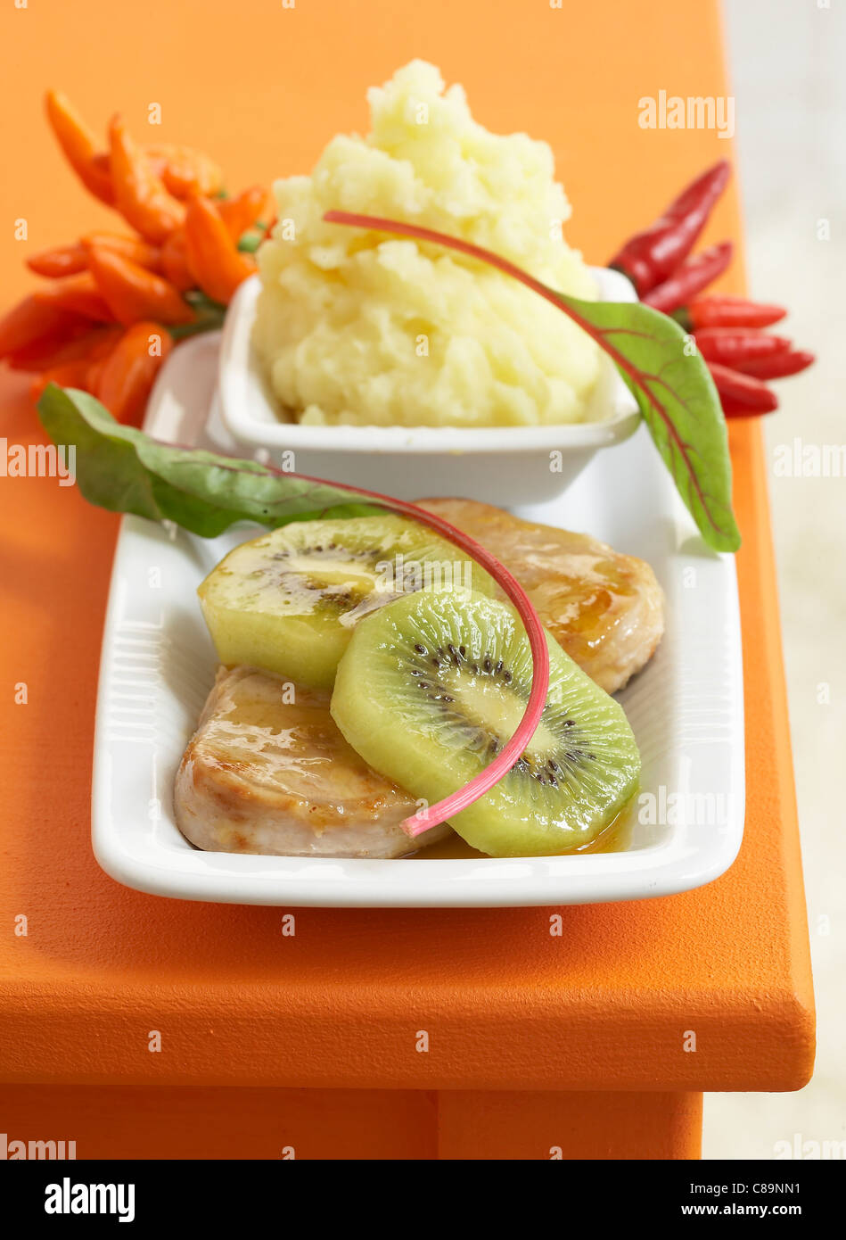 Pork Filet Mignon with kiwis Stock Photo - Alamy