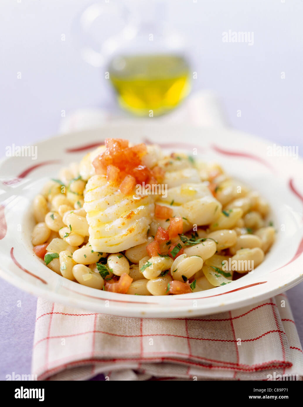 Fresh cod with white beans Stock Photo - Alamy
