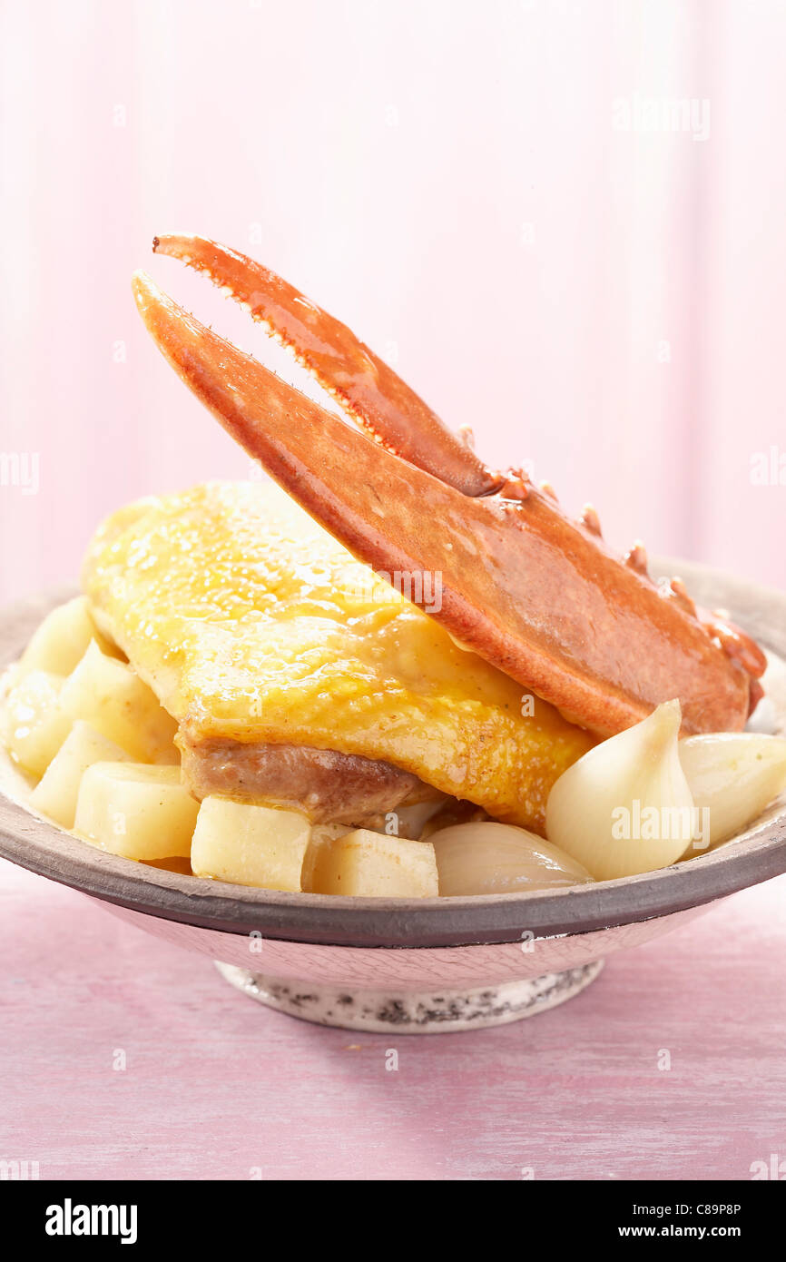 Chicken leg with lobster and root celery Stock Photo - Alamy
