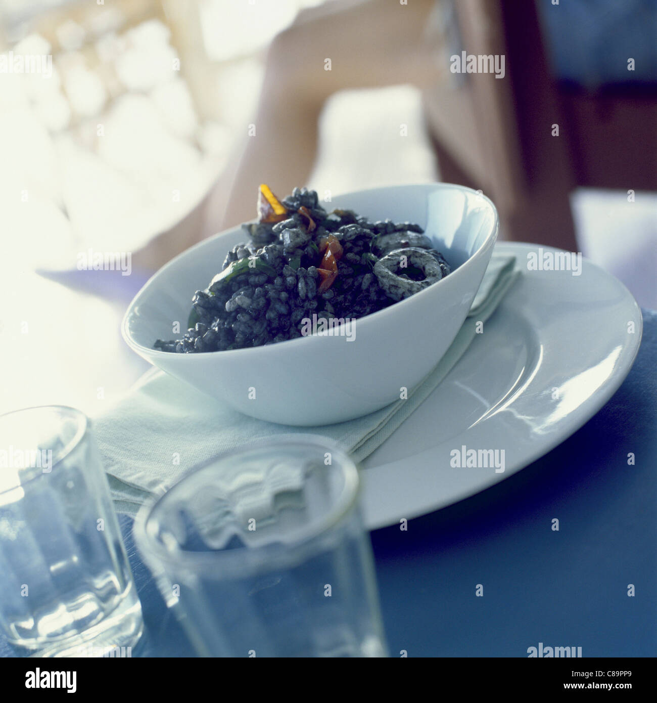 Rice with squid ink juice Stock Photo - Alamy