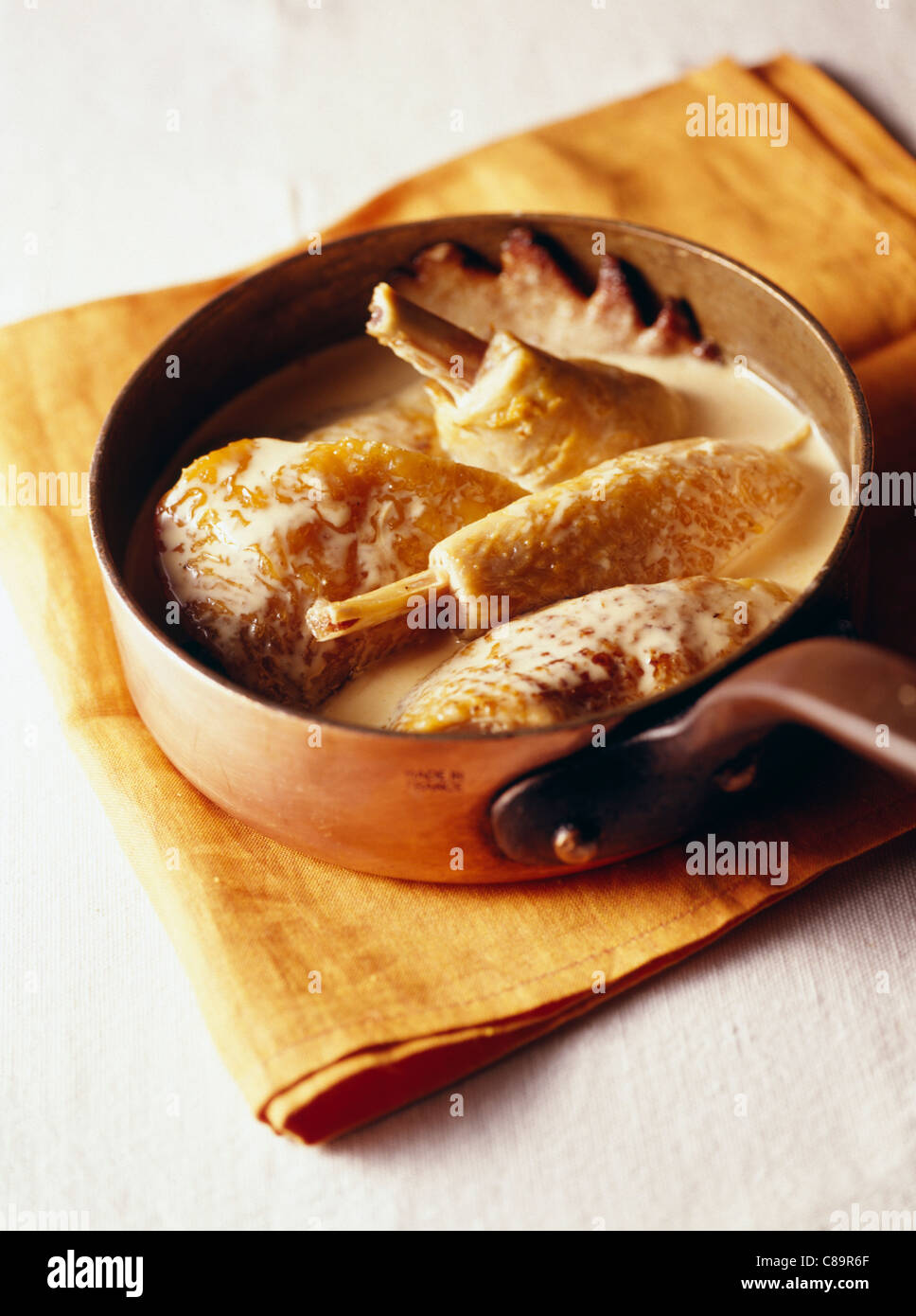 Bresse chicken creamy fricassée Stock Photo - Alamy