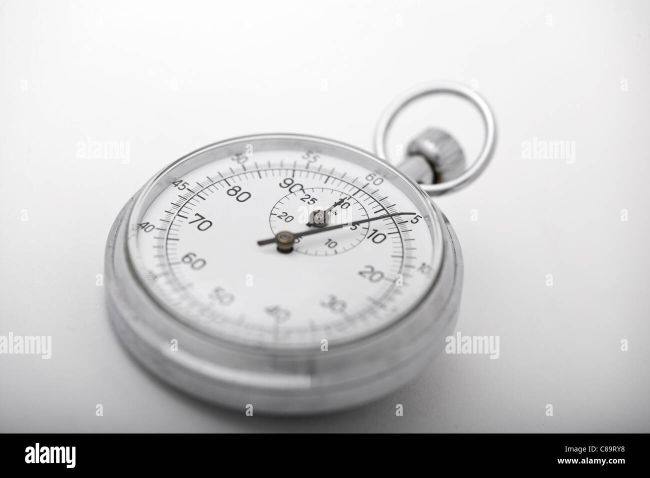 Close up of classic analog stop watch on white background Stock Photo ...